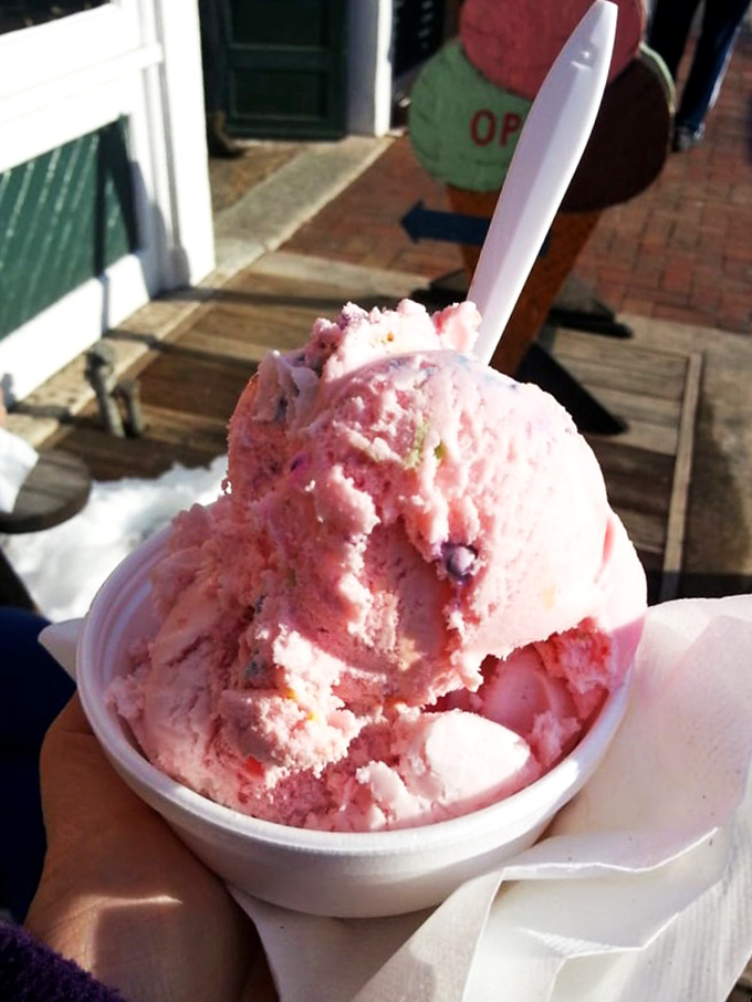 Strawberry ice cream with visible berries&mdash;proof that sometimes the simplest pleasures are the most profound.