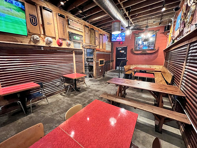 Red tables, industrial elements, and just enough sports on TV to give you something to stare at between bites of chicken-induced euphoria. 