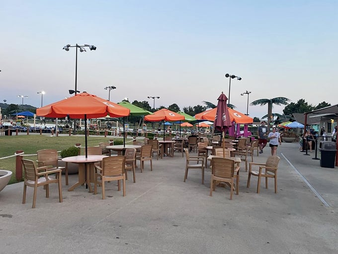 Sunset at the waterpark casts a golden glow over happy, exhausted swimmers &ndash; that magical hour when children finally begin to tire out. 