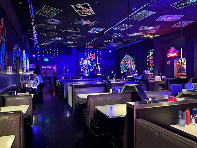 Even in the dark, you can feel the retro vibes. These booths have probably witnessed more first dates than a high school guidance counselor.