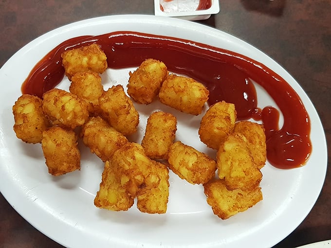 Tater tots: not just for school cafeterias anymore. These crispy potato nuggets are the grown-up indulgence you deserve, paired with unapologetic ketchup.