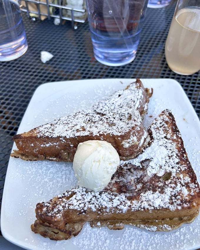 French toast triangles dusted with powdered sugar snow, with ice cream melting into warm crevices. Breakfast? Dessert? The line deliciously blurs.