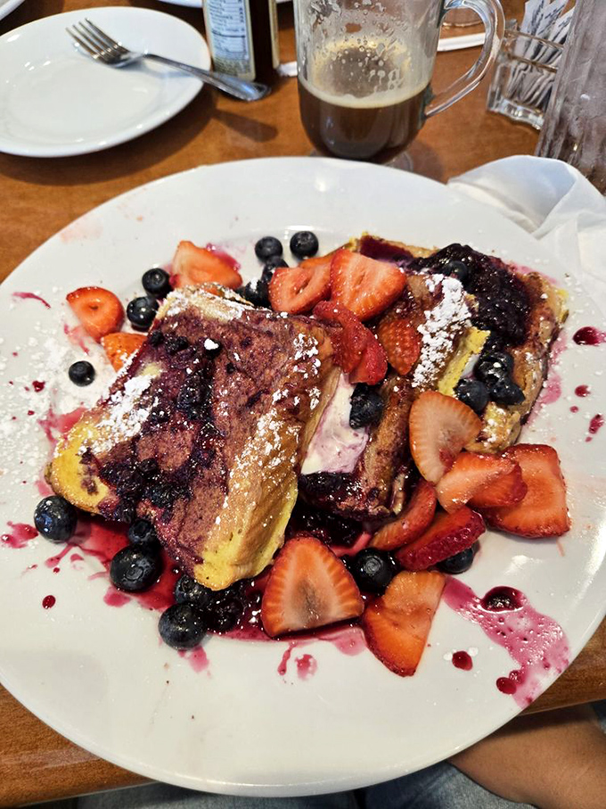 Berry-kissed French toast that makes you wonder if breakfast might actually be the most important relationship of your day.
