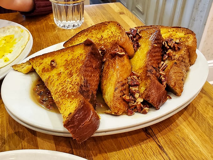 French toast that doesn't just satisfy hunger&mdash;it fulfills breakfast dreams. Those caramelized edges and pecan topping deserve their own thank-you note.