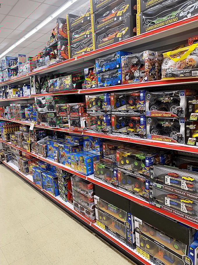 Toy aisle nirvana where childhood dreams meet parental budget realities. From Lamborghinis to monster trucks, imagination fuel fills every shelf.