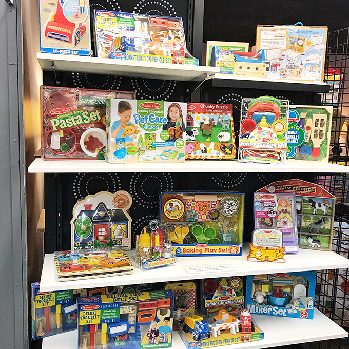 A toy section that reminds us that joy doesn't have an expiration date—just the occasional missing piece that adds character to the story.
