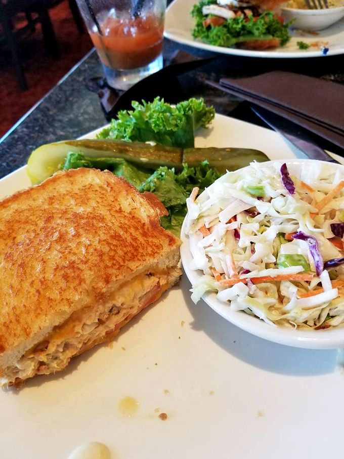 This tuna melt with slaw isn't just lunch; it's comfort disguised as a sandwich, a culinary hug on a particularly good day.