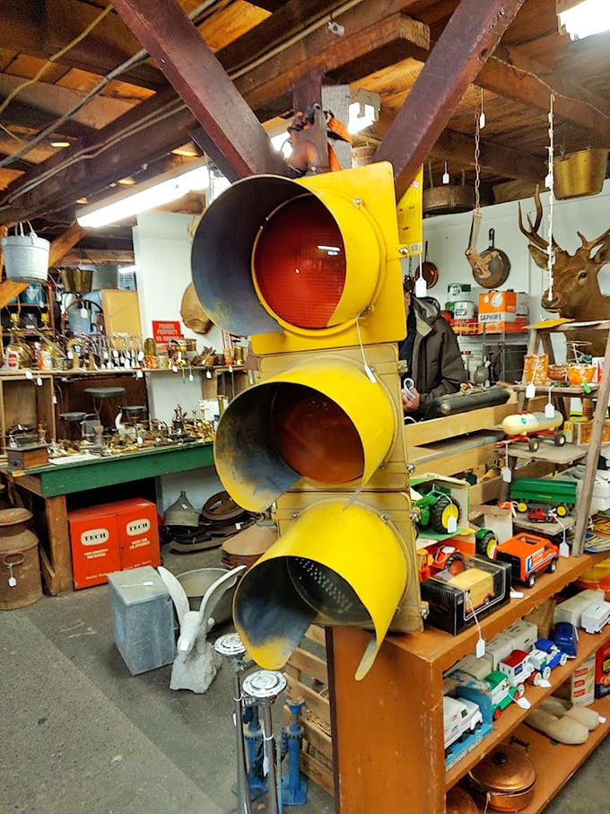 A traffic light that once directed rush hour now directs attention in someone's man cave. Talk about a conversation starter!