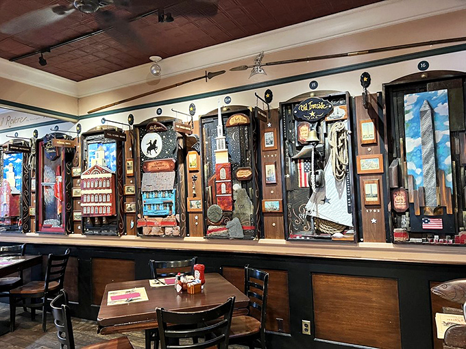 A wall of meticulously crafted historical displays that make waiting for your table feel like exploring a maritime museum where food is the star attraction.
