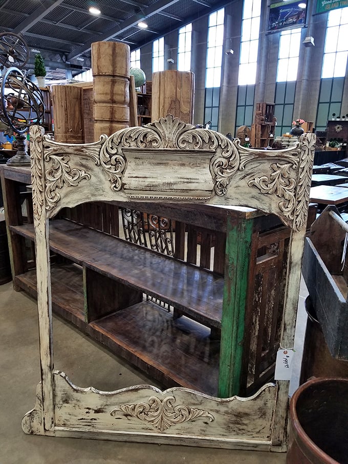 This distressed headboard tells more stories than a novelist. Shabby chic before it was a Pinterest board. 