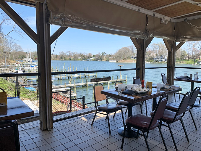 Waterfront dining with a view that reminds you where your meal came from. Those empty tables won't stay that way for long.