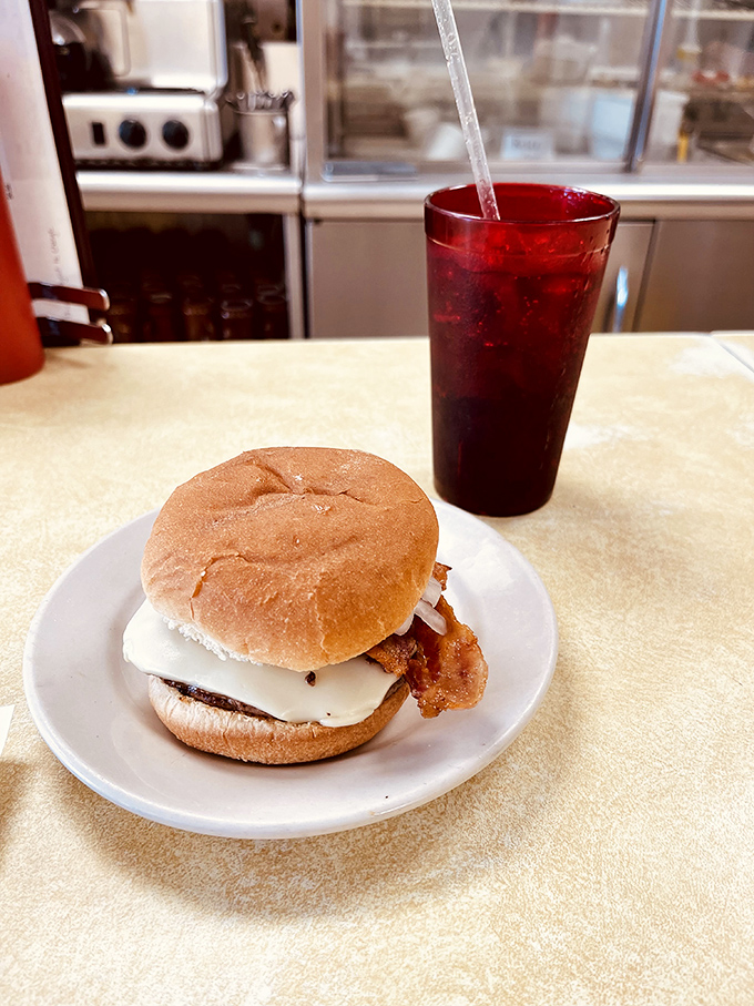 The breakfast sandwich that launched a thousand workdays. American cheese and bacon: the dynamic duo of morning satisfaction. 