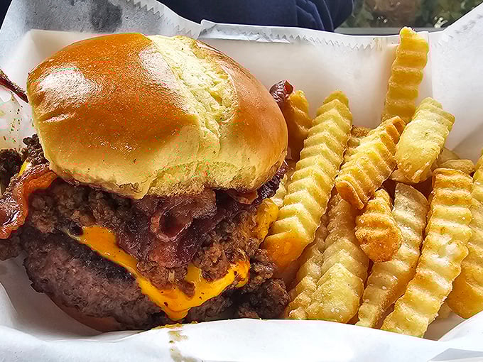 This isn't just a bacon cheeseburger&mdash;it's a monument to excess done right. Those crinkle-cut fries are the perfect supporting cast.