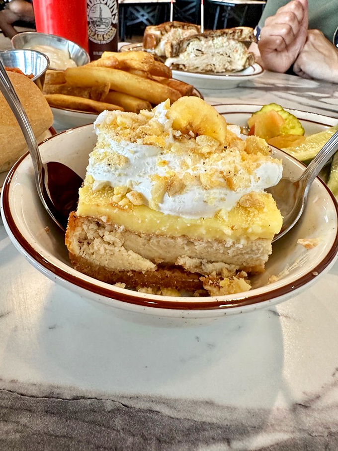 Banana cheesecake that makes you question why you've wasted time on lesser desserts. That graham cracker crust deserves its own fan club.