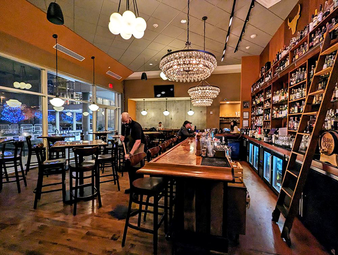 The bar gleams with infinite possibilities, each bottle promising stories and spirits that perfectly complement your evening's adventure.