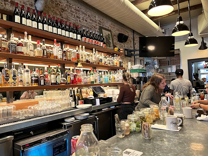 Behind the bar, bottles stand at attention like soldiers ready to enhance your meal with liquid reinforcements&mdash;brunch cocktails aren't just allowed, they're encouraged.