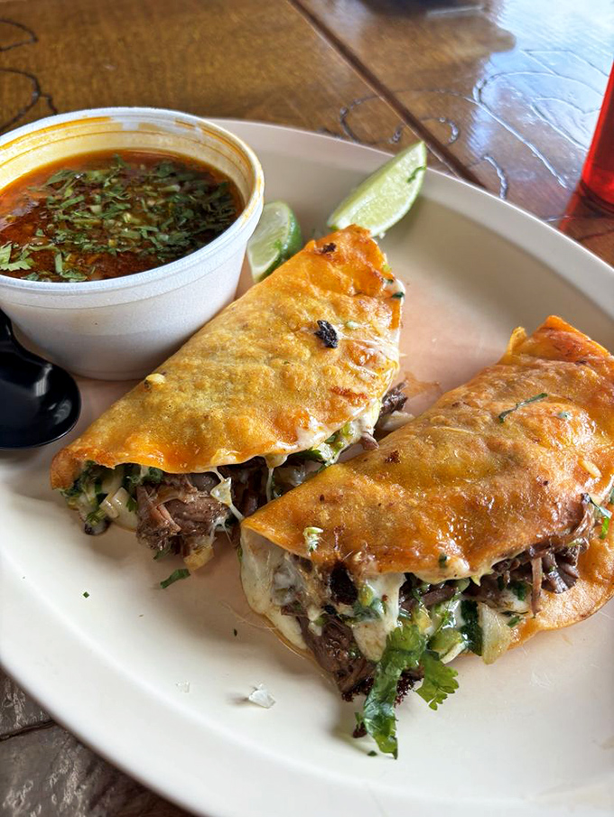 Birria tacos: crispy, cheesy, meaty perfection with consommé for dipping. Like French dip sandwiches that went on a life-changing trip to Mexico.
