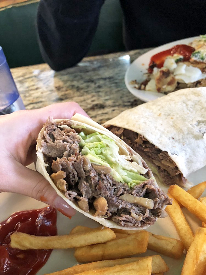 A wrap that's achieved perfect structural integrity while housing a neighborhood of flavors between its warm, floury walls.