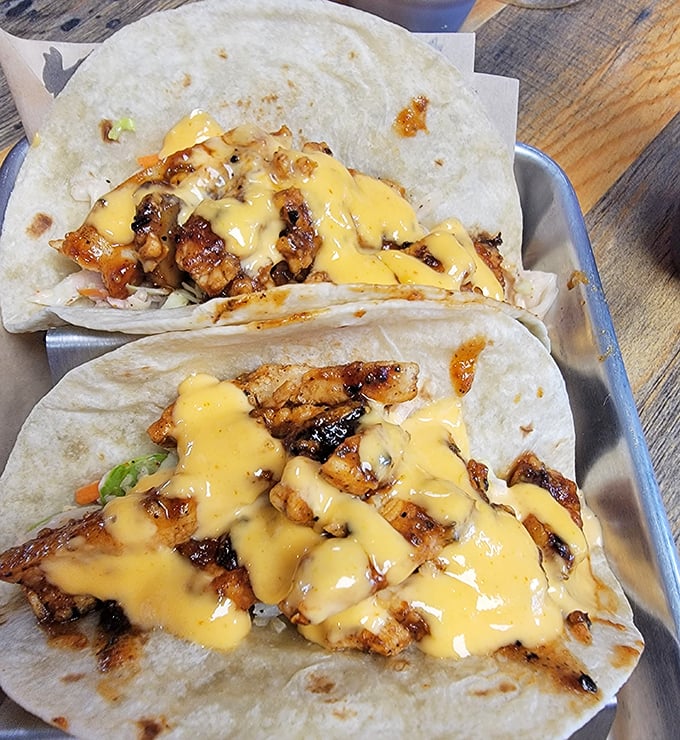 Soft tortillas cradling seasoned meat and cheese sauce &ndash; like edible hugs that somehow taste even better than they look. 