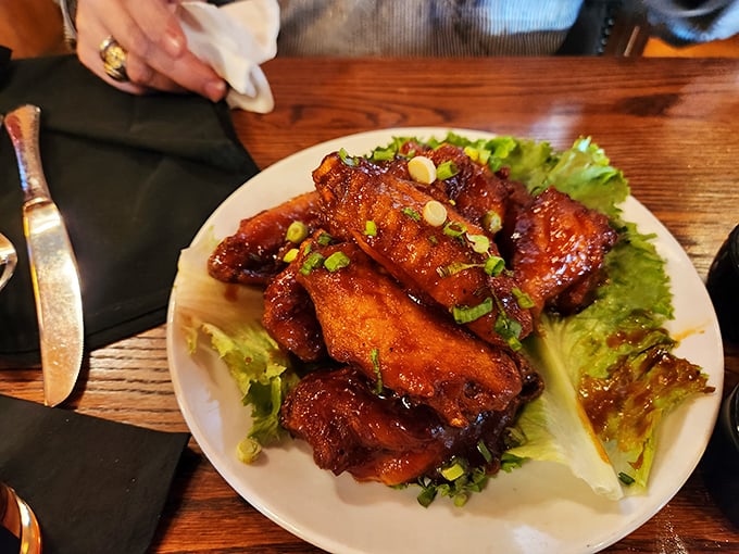 Wings that make you forget you're in a steakhouse. These glossy, sauce-lacquered beauties prove Hamley's culinary prowess extends beyond beef. 