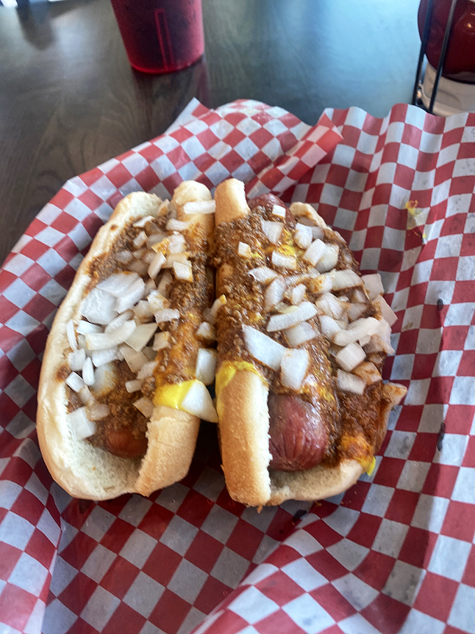 Coney dogs with that perfect ratio of meat, bun, chili, and onions &ndash; a handheld masterpiece that demands both napkins and respect.