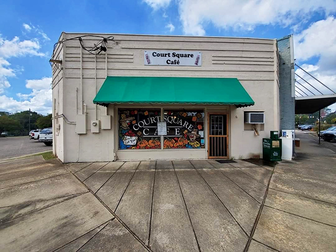 Court Square Cafe's colorful window art is like a preview trailer for the flavor blockbuster waiting inside this unassuming building.