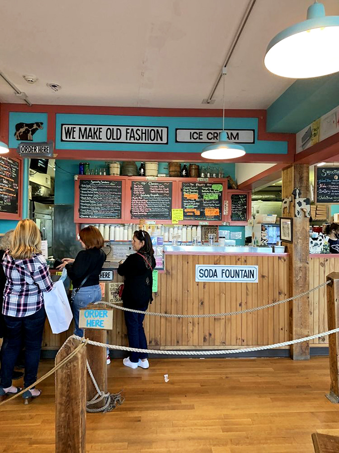 The line forms here for happiness. These customers aren't just waiting for ice cream—they're queuing for an experience worth savoring.