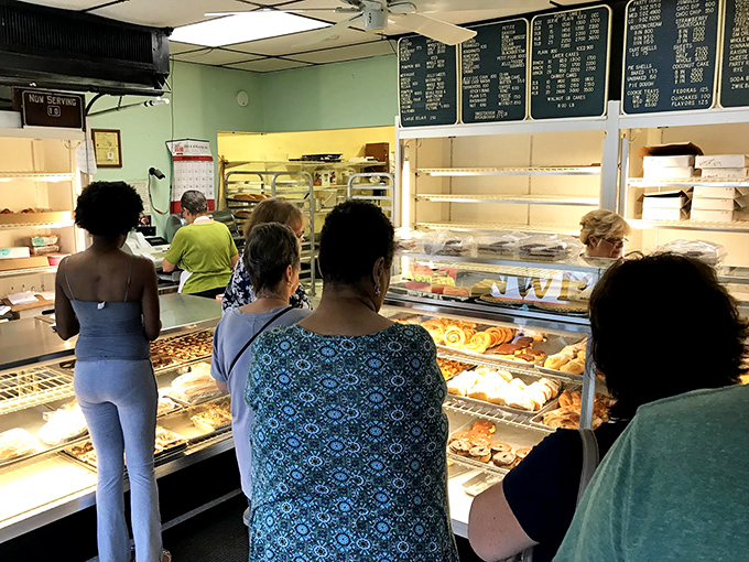 The universal language of anticipation – customers patiently waiting their turn for a taste of Baltimore's sweetest traditions.