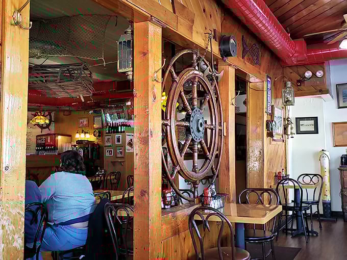 That ship's wheel isn't just decoration&mdash;it's steering this dining room through decades of delicious memories. Maritime charm meets Midwestern hospitality.
