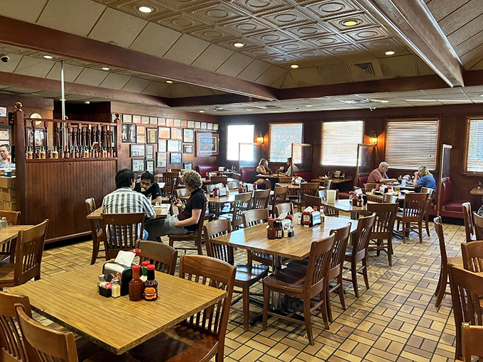 The dining room hums with the satisfied murmurs of barbecue pilgrims. Every table tells a story of smoky tradition and Southern hospitality.