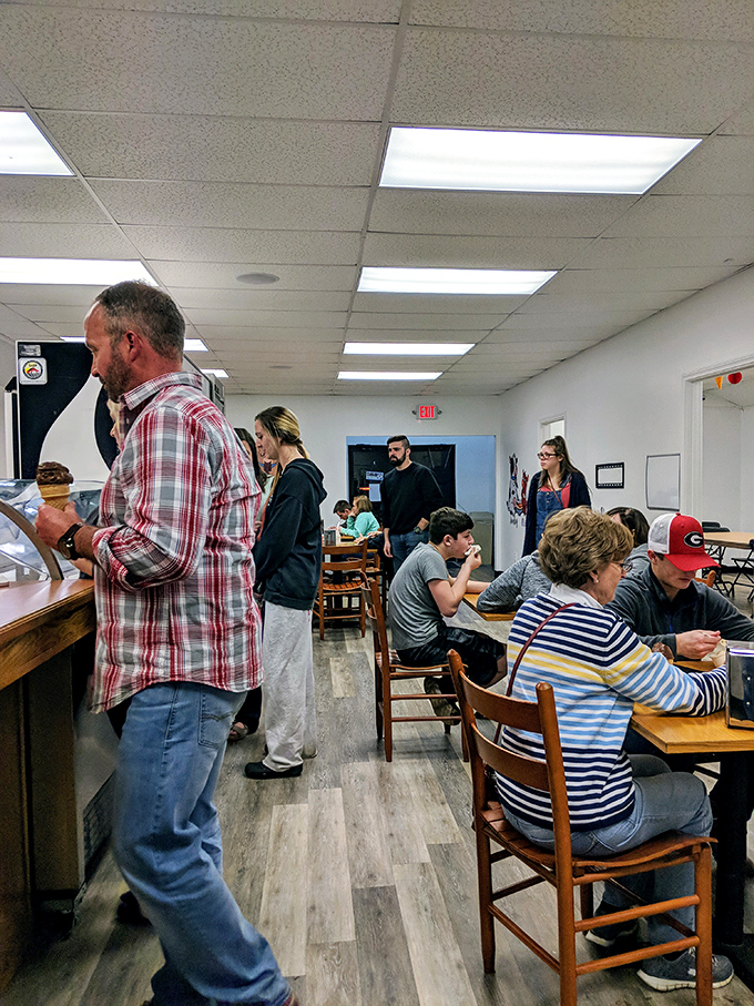 The universal language of ice cream brings together plaid shirts and striped sweaters in peaceful, delicious harmony.