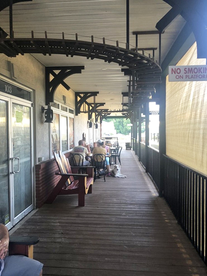 The covered porch offers al fresco dining with a side of people-watching&mdash;where breakfast meets fresh air in a delightful morning conspiracy.