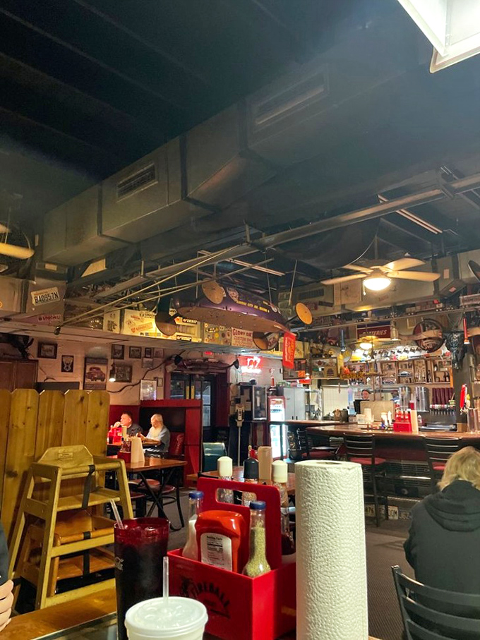 The dining room tells stories through its decorations while patrons create new memories over plates of smoky, slow-cooked perfection.