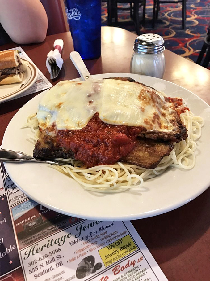 Eggplant parmesan that could convert carnivores. That melted cheese pull would make any food photographer weep with joy.