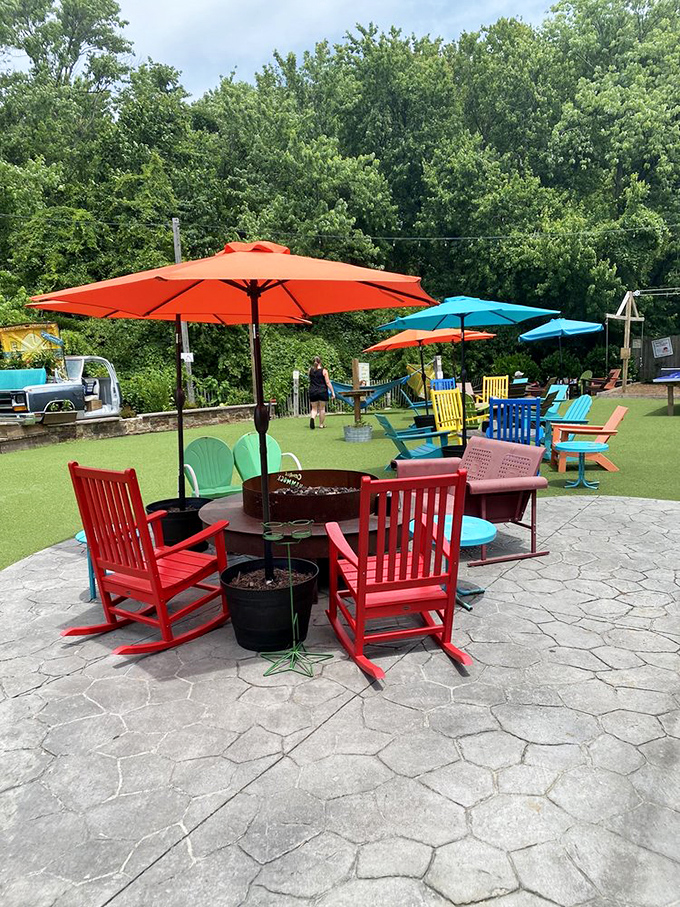 Candy-colored rocking chairs gathered around fire pits &ndash; because the best conversations happen when comfort meets crackling flames and cold beverages.