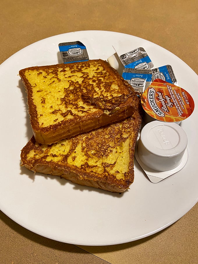 French toast that's achieved that mythical golden-brown perfection that home cooks attempt for years. The butter's already melting!