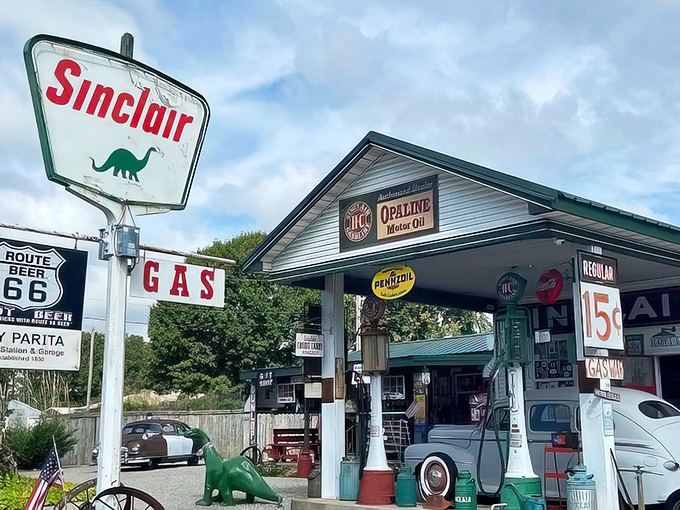 Gay Parita's restored Sinclair station, complete with smiling dinosaur mascot. The 15&cent; gas price is the cruelest joke in roadside America.