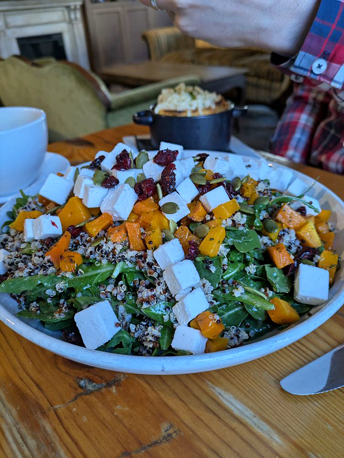 The bar showcases bottles like museum exhibits, promising libations that pair perfectly with that French onion soup you're still thinking about.