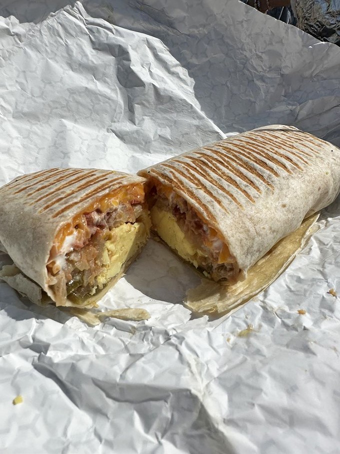 The Haystack Wrap, sliced to reveal its secrets: eggs, cheese, and breakfast meats wrapped in a warm tortilla hug.