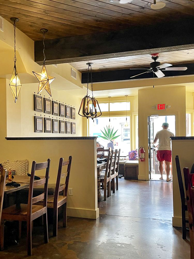 Interior design that whispers rather than shouts, where star-shaped pendant lights cast the kind of glow that makes everyone look like they're on vacation.