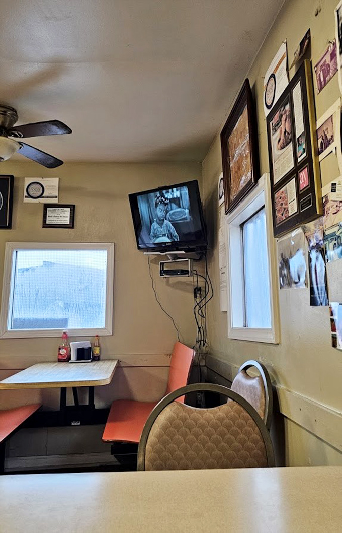 Simple tables, classic chairs, and a TV playing in the corner. It's not fancy, but neither was your grandmother's kitchen.