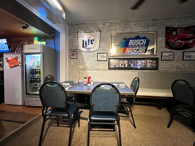 NASCAR memorabilia and beer signs create that "everybody knows your name" vibe that makes a meal feel like coming home.