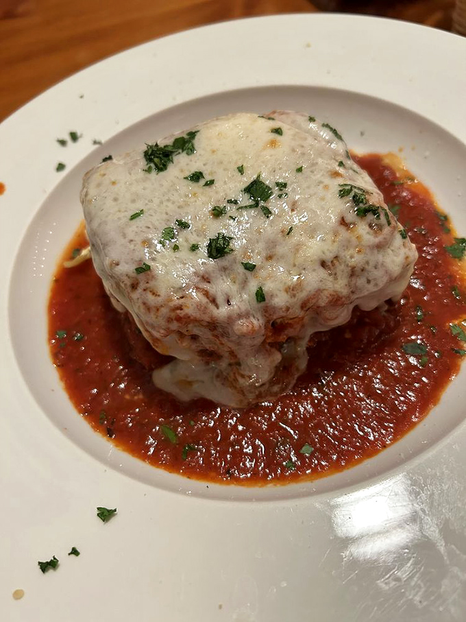 Lasagna that doesn't just sit on the plate&mdash;it stands at attention, layers of pasta, cheese, and sauce in perfect harmony.