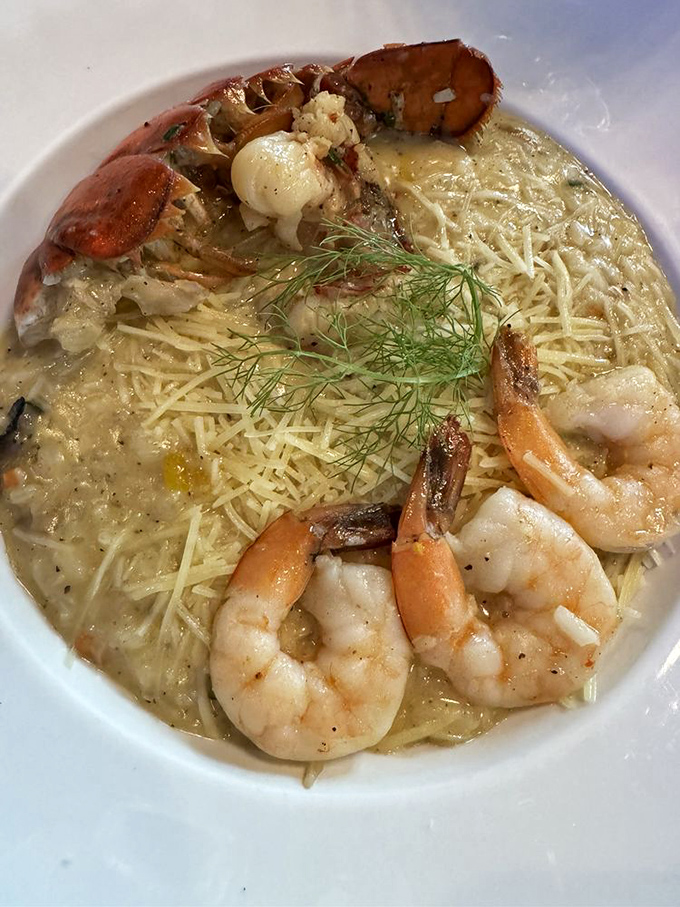 Seafood risotto that whispers "I could have been a chef in another life" &ndash; creamy, indulgent, and worth every moment spent at the gym tomorrow.