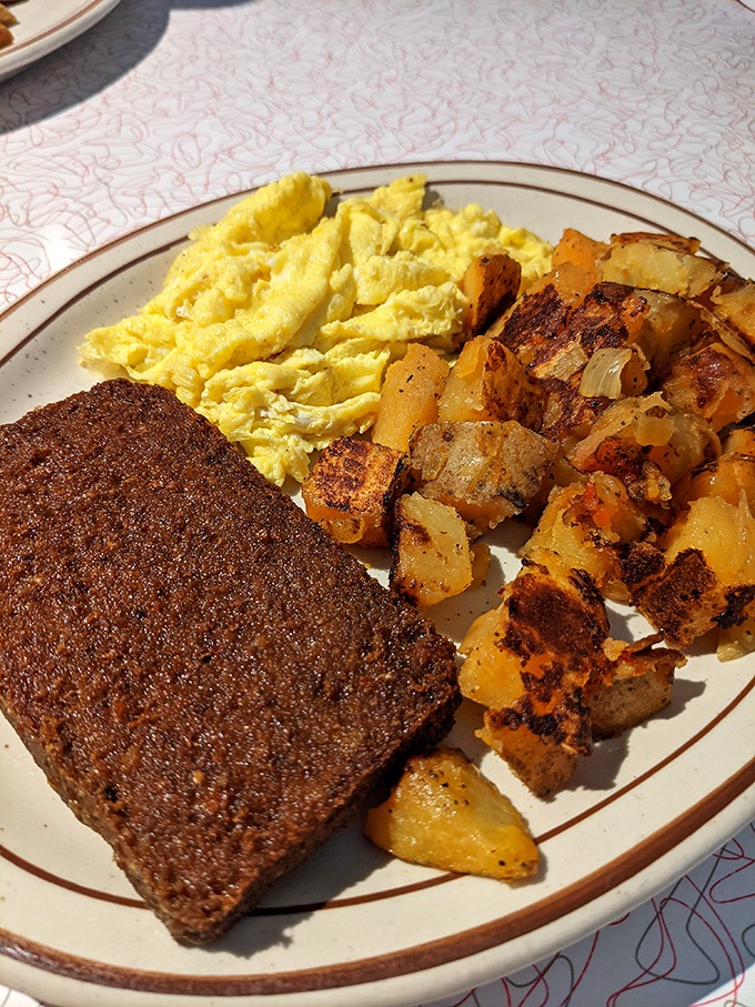 Scrapple that doesn't try to hide what it is &ndash; a breakfast meat with conviction, paired with eggs that know better than to steal its spotlight.