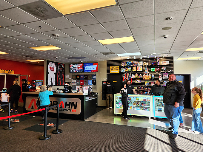 The merchandise counter offers everything a racing enthusiast needs. Because what's the point of winning if you can't wear the t-shirt? 