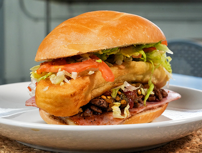 The torta that launched a thousand food pilgrimages. That crispy milanesa peeking out from pillowy bread is the sandwich equivalent of a standing ovation.