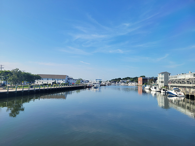 The Mystic River reflects the town's quiet confidence, a glassy runway where history and modernity glide alongside each other in perfect harmony.