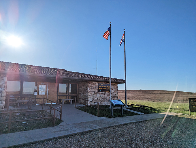 Morning light bathes the visitor center in golden warmth. The perfect starting point for prairie explorations—with actual bathrooms!