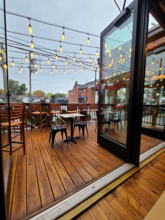 The outdoor deck at Breakfast AF isn't just seating&mdash;it's prime Louisville real estate for coffee sipping and people watching. Those string lights seal the deal.